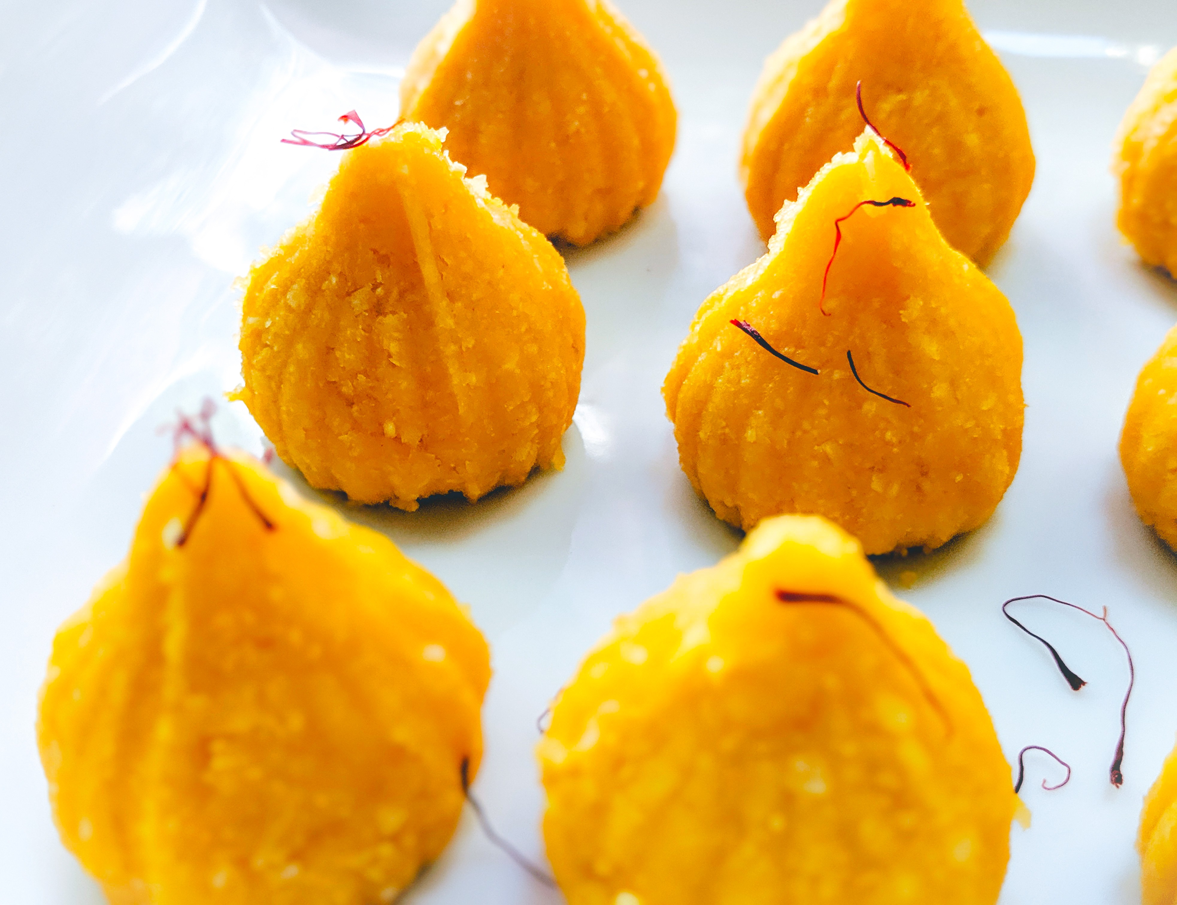 Mango Modak - Sizzling Bite Mango Modak Desserts - Sizzling Bite